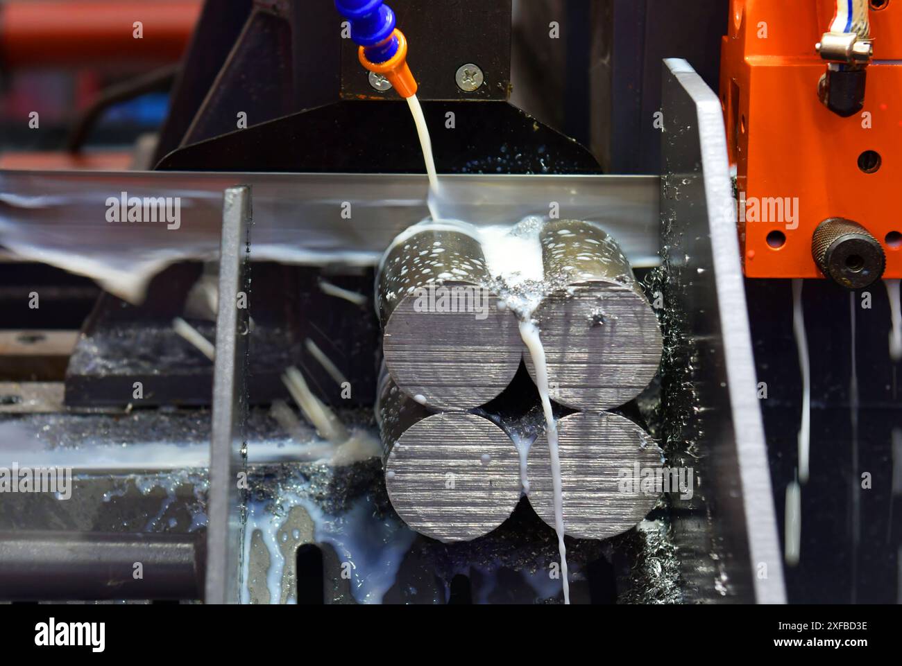 Industrial metal working cutting process The raw material bar clamping ...