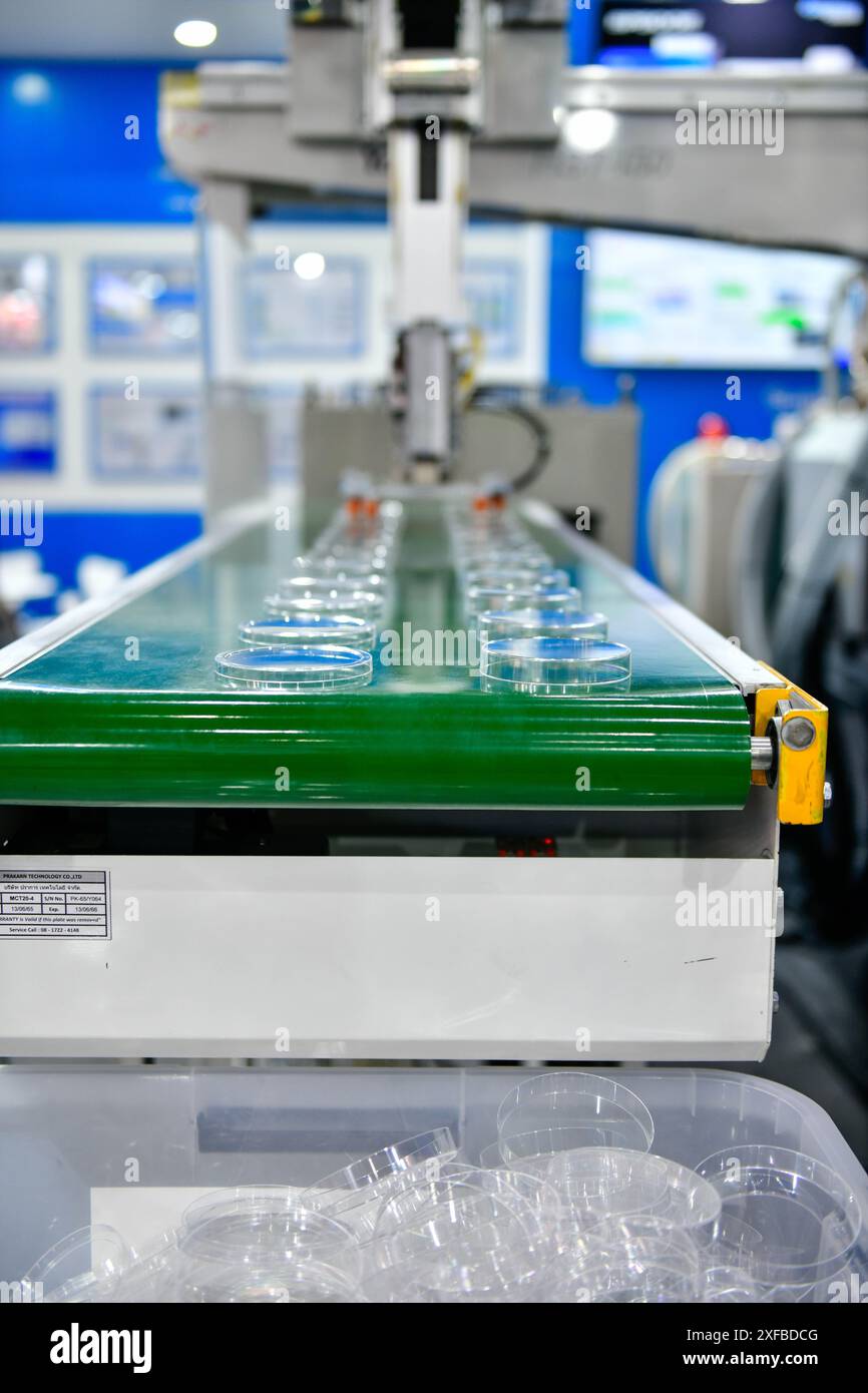 The operation of automatic plastic drinking glass lid production ...