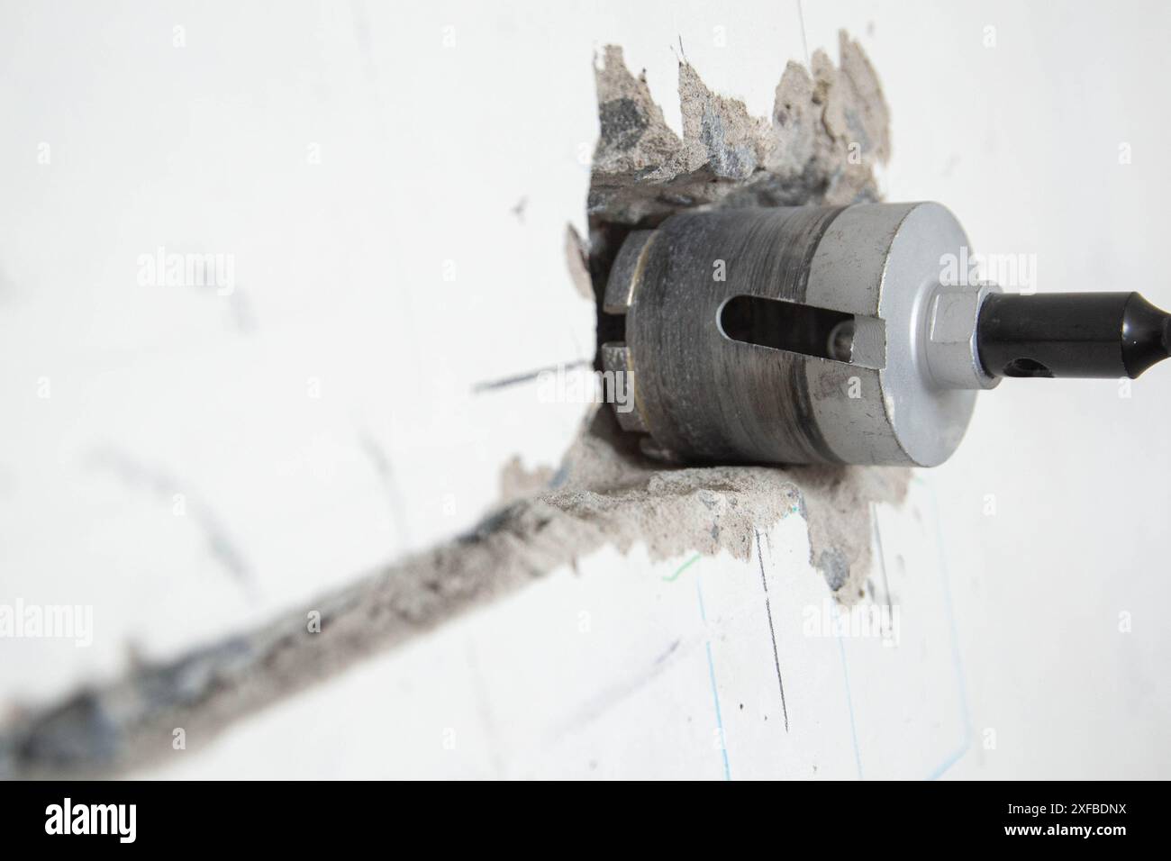 drilling holes in a concrete wall for socket boxes with a diamond core ...
