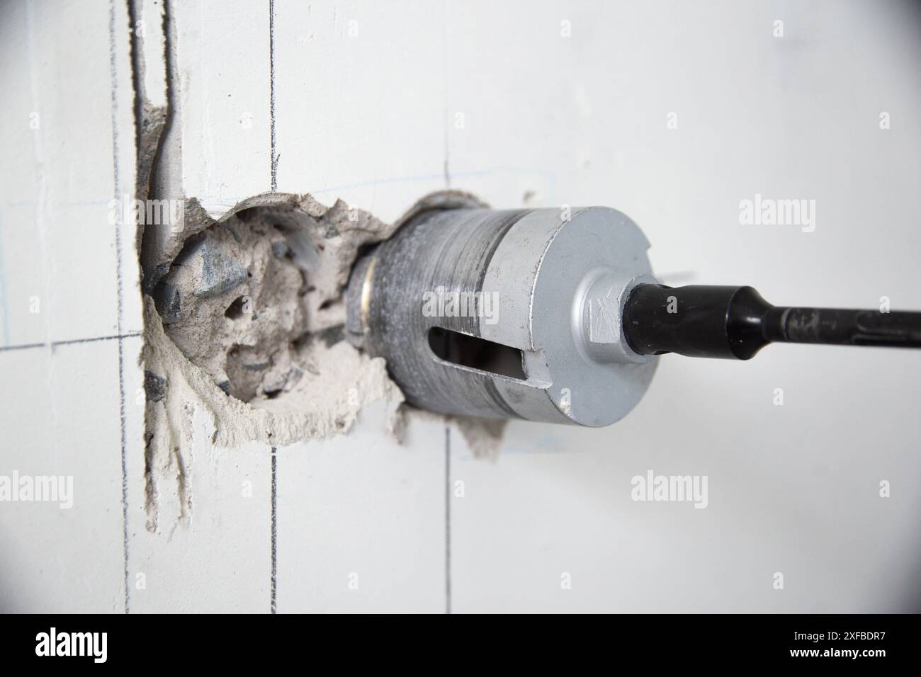 drilling holes in a concrete wall for socket boxes with a diamond core ...
