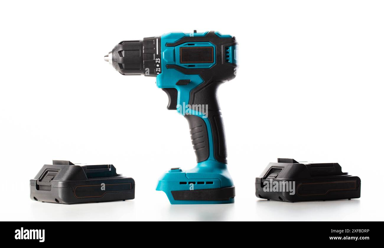 Modern drill and screwdriver with two batteries and a keyless chuck ...