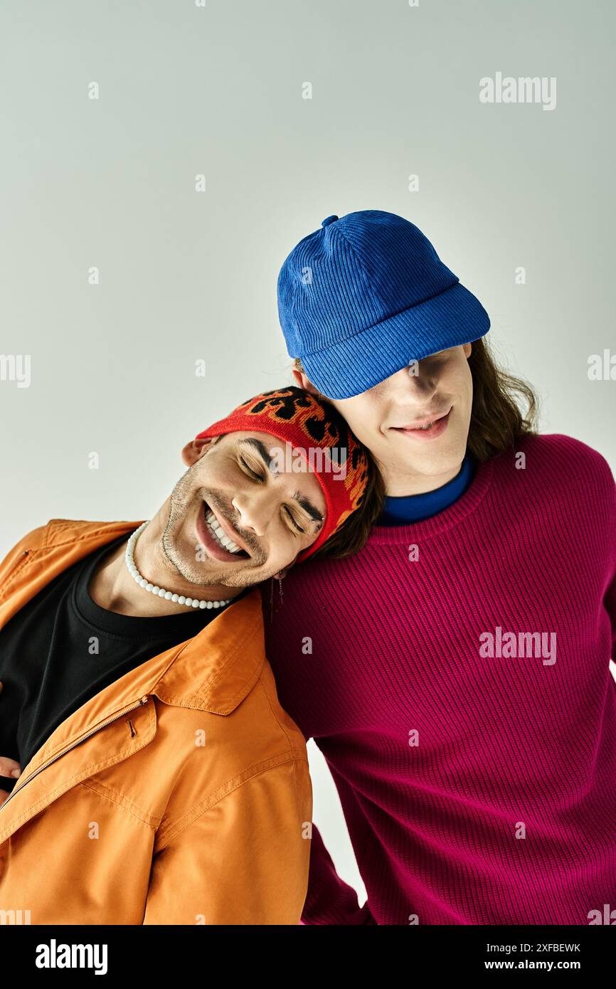 Two men posing together for a picture Stock Photo - Alamy