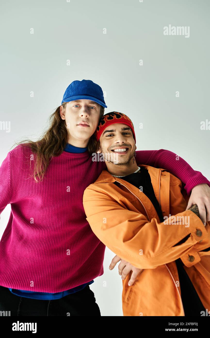 An elegant two men posing together in a charming moment Stock Photo - Alamy