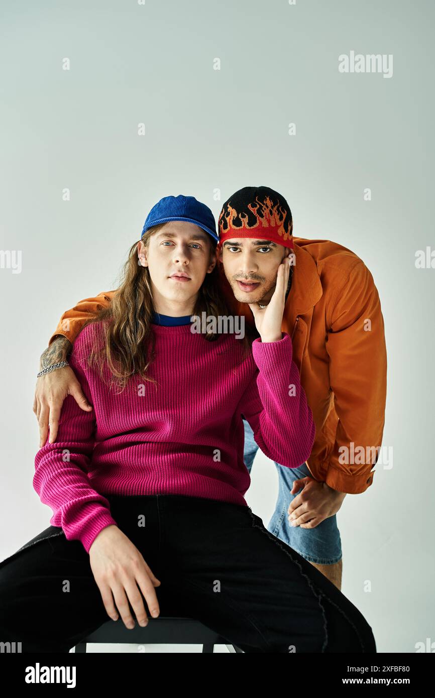 two men strike a pose for a photo, exuding joy and love Stock Photo - Alamy