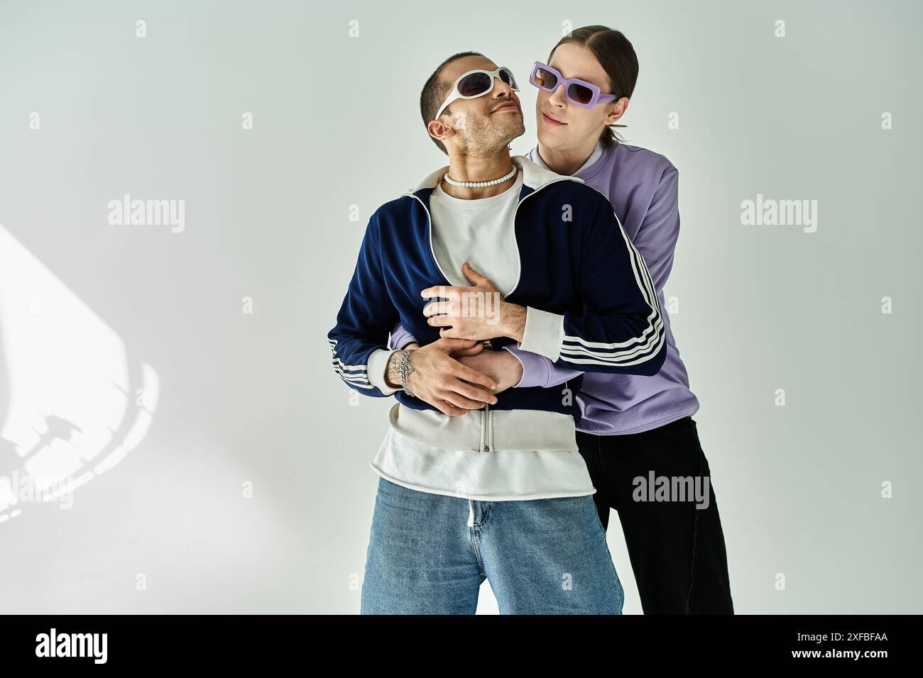 two men share a moment standing together Stock Photo - Alamy
