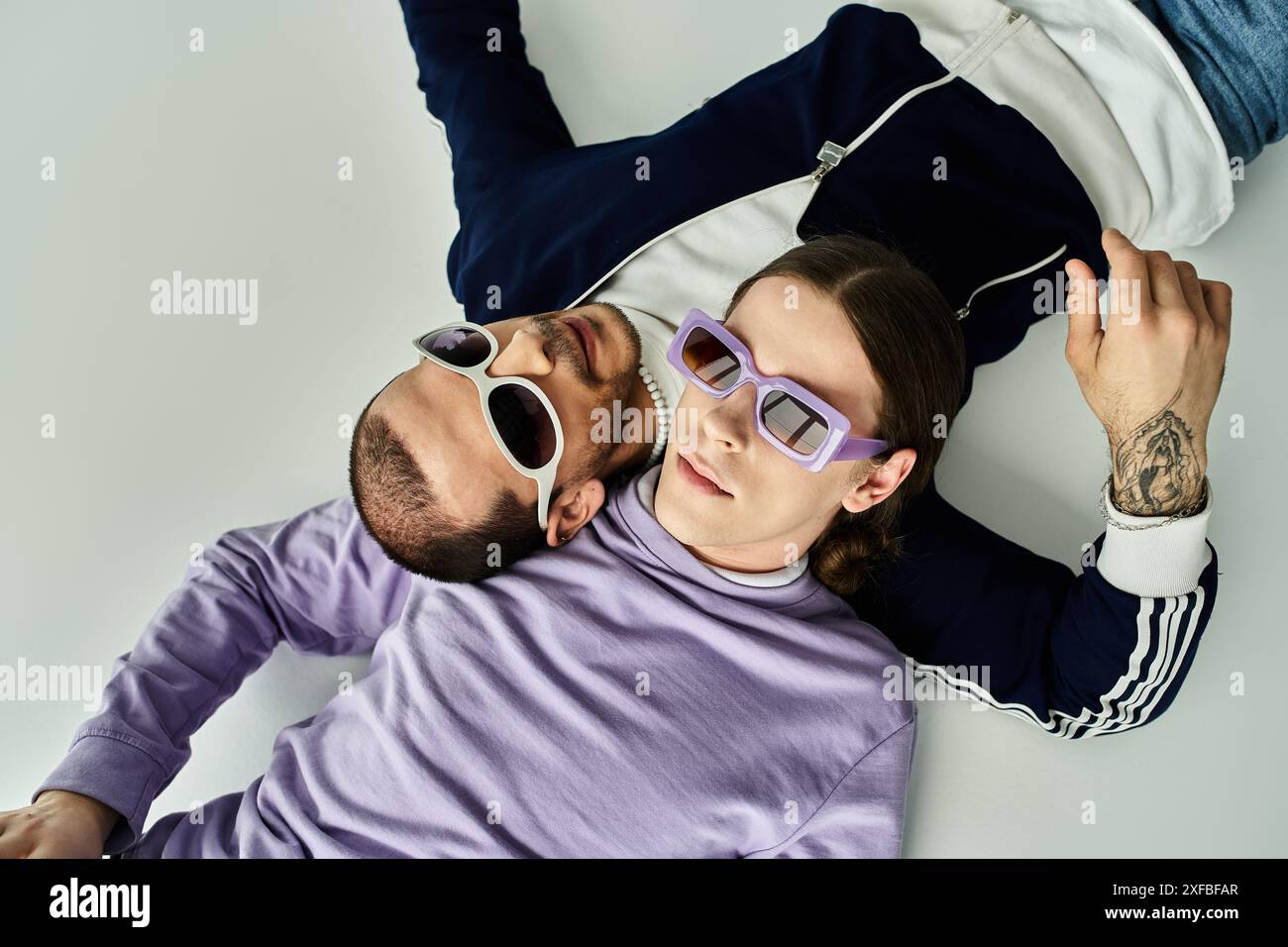 Intertwined pose hi-res stock photography and images - Alamy