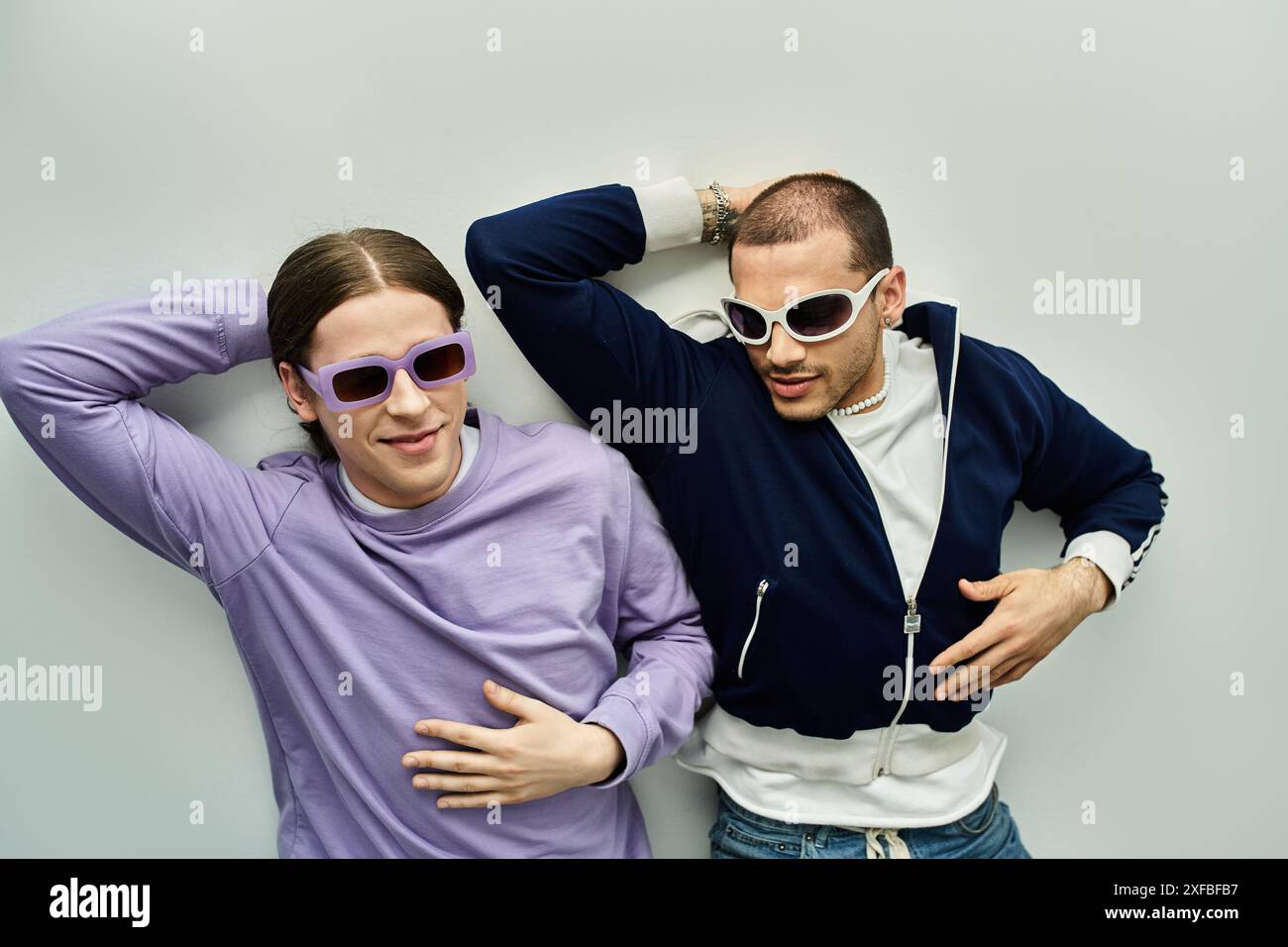 Two friends pose camera in hi-res stock photography and images - Alamy