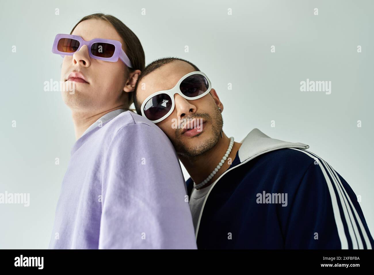 Two young gay men pose hi-res stock photography and images - Alamy