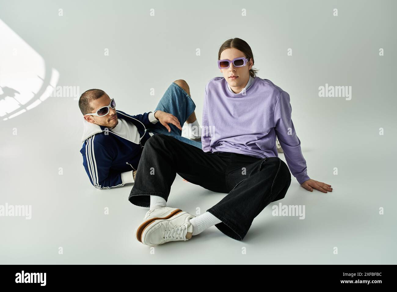 Two men deep in hi-res stock photography and images - Alamy