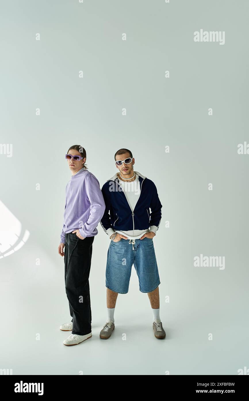 Two men standing together hi-res stock photography and images - Alamy