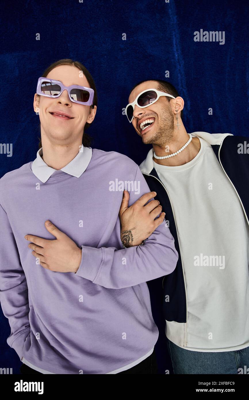 Two young gay men pose hi-res stock photography and images - Alamy