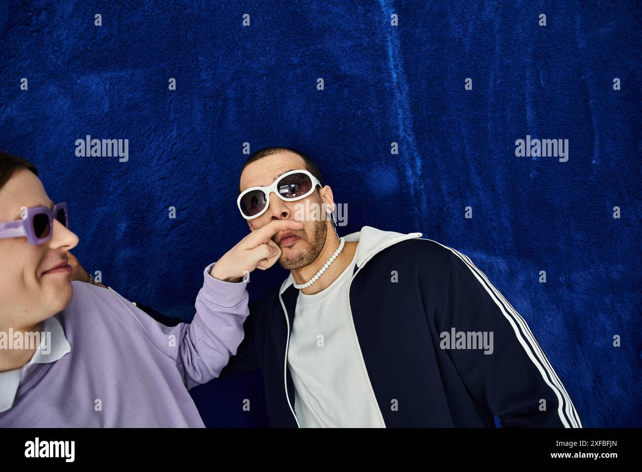 Two men standing together hi-res stock photography and images - Alamy