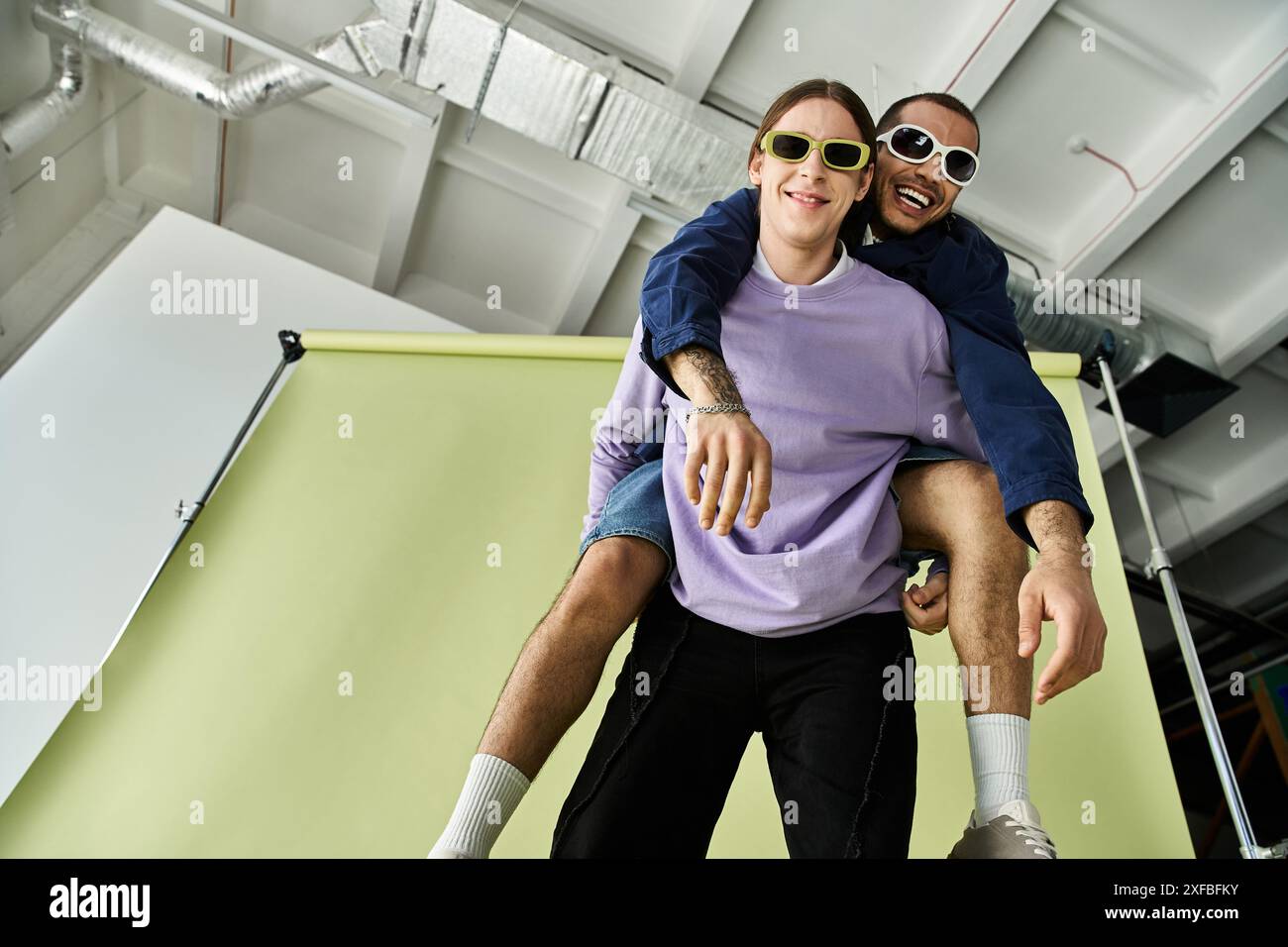 Two attractive men enjoy quality time together Stock Photo - Alamy