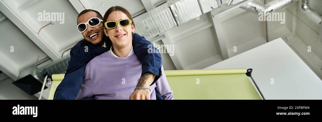 A man carries partner on his back in a loving and supportive gesture ...