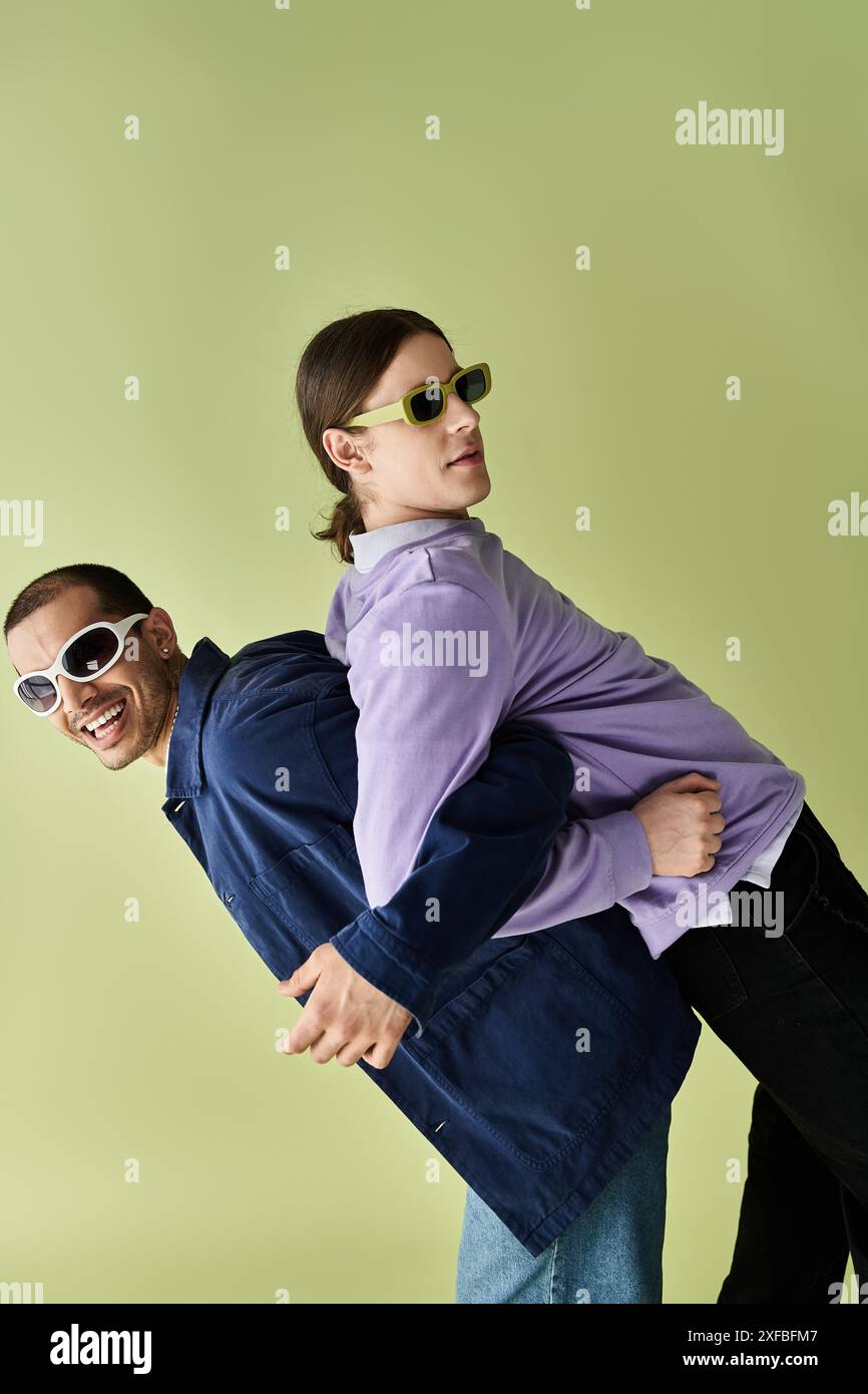 A man carrying his partner on his back, showing strength and love Stock ...