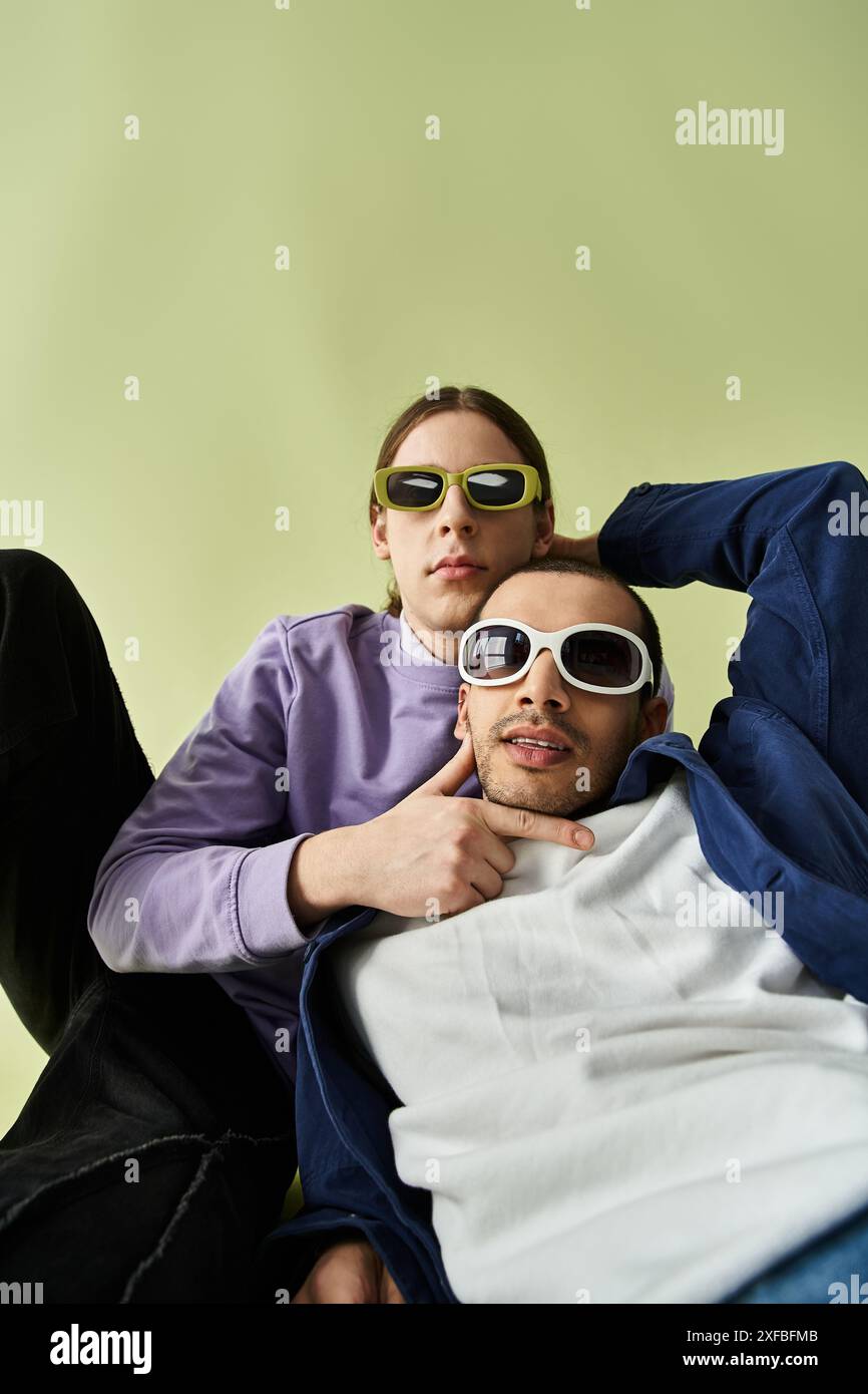 Two men sitting together hi-res stock photography and images - Alamy