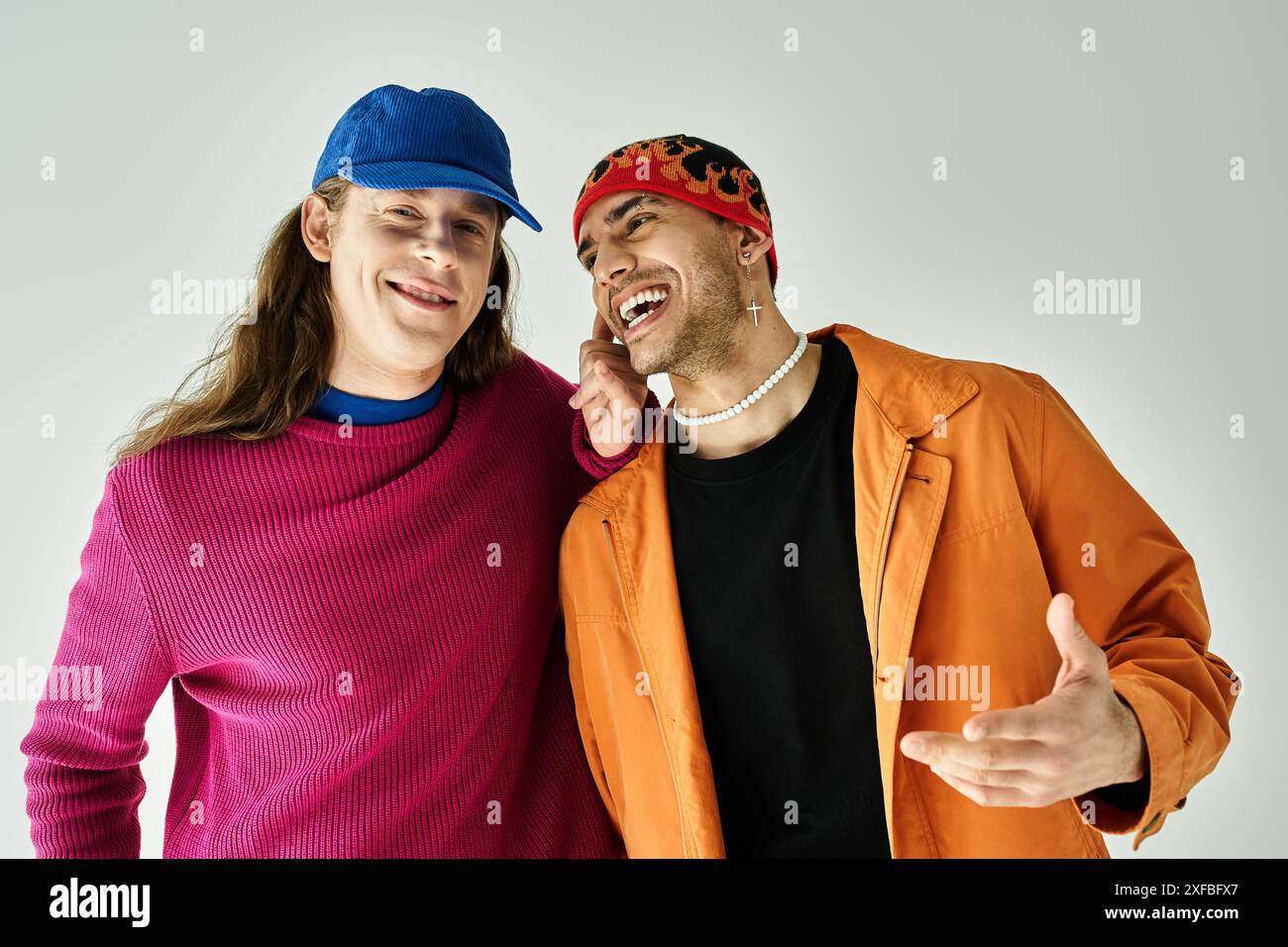 Two young men pose photo hi-res stock photography and images - Alamy