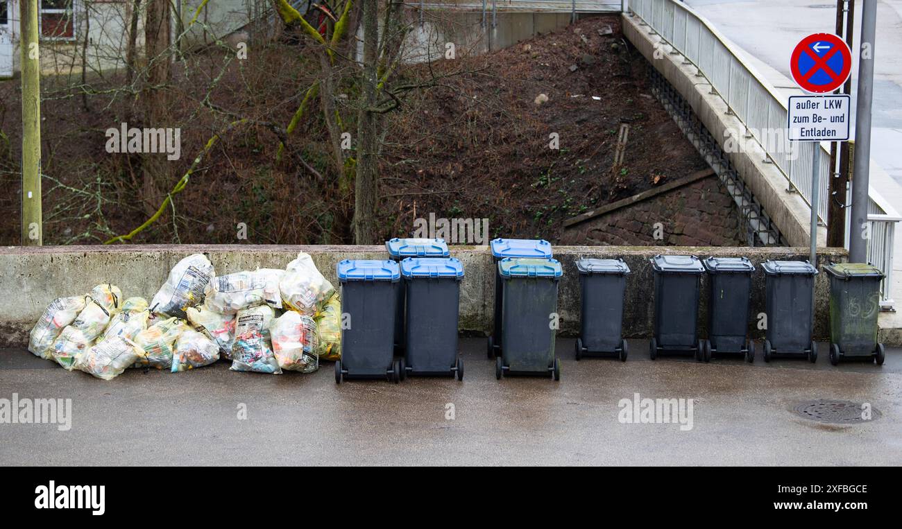 Pile of waste plastic trash bags and bins in Germany, garbage ...
