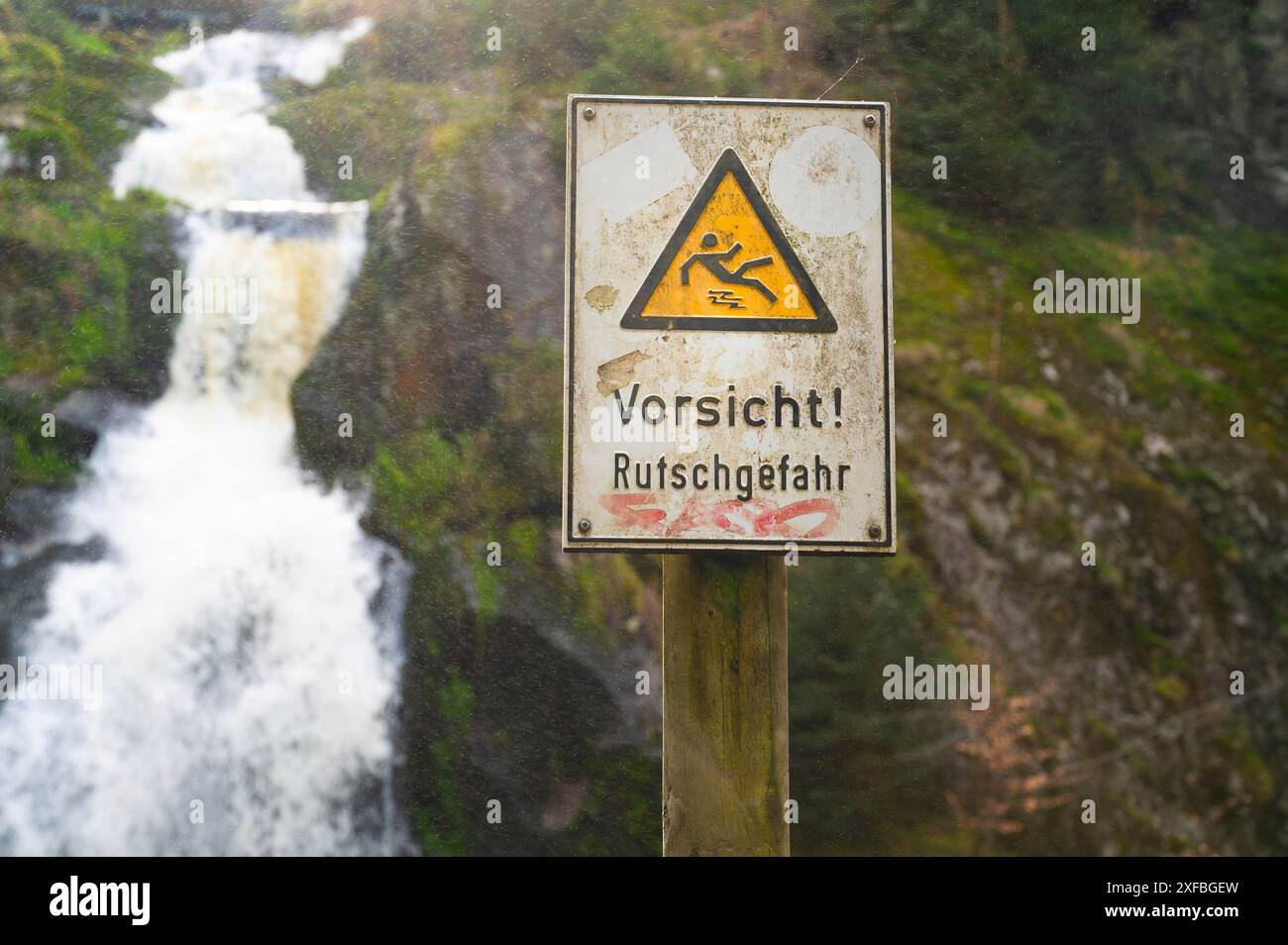 Slippery warning sign, Triberg waterfall in the Black Forest, highest ...