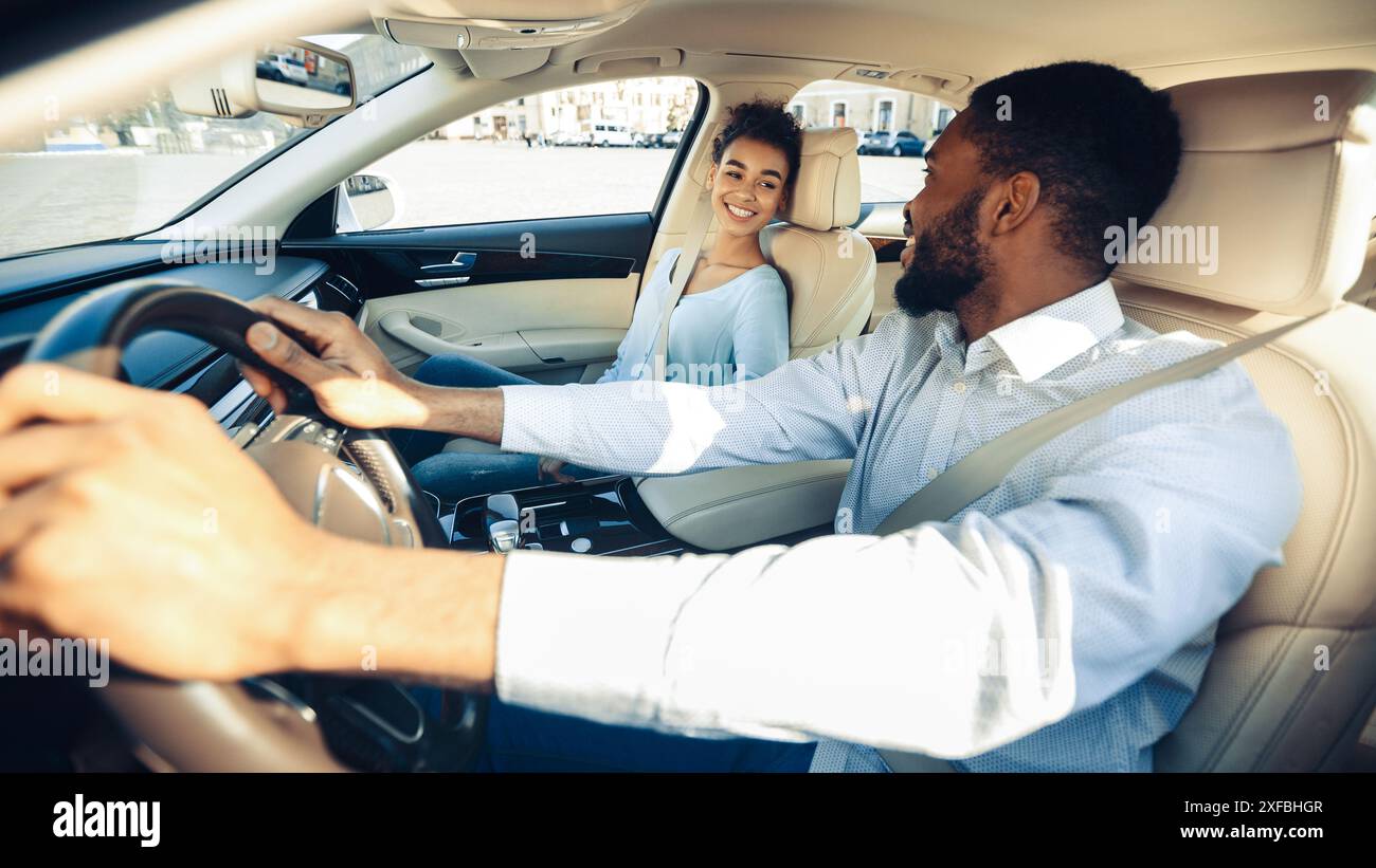 Black man in car city hi-res stock photography and images - Alamy