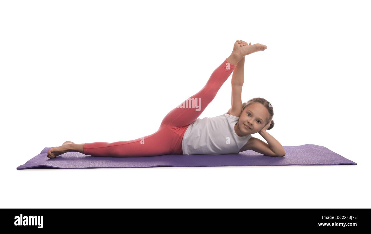 Cute little girl stretching on white background Stock Photo - Alamy