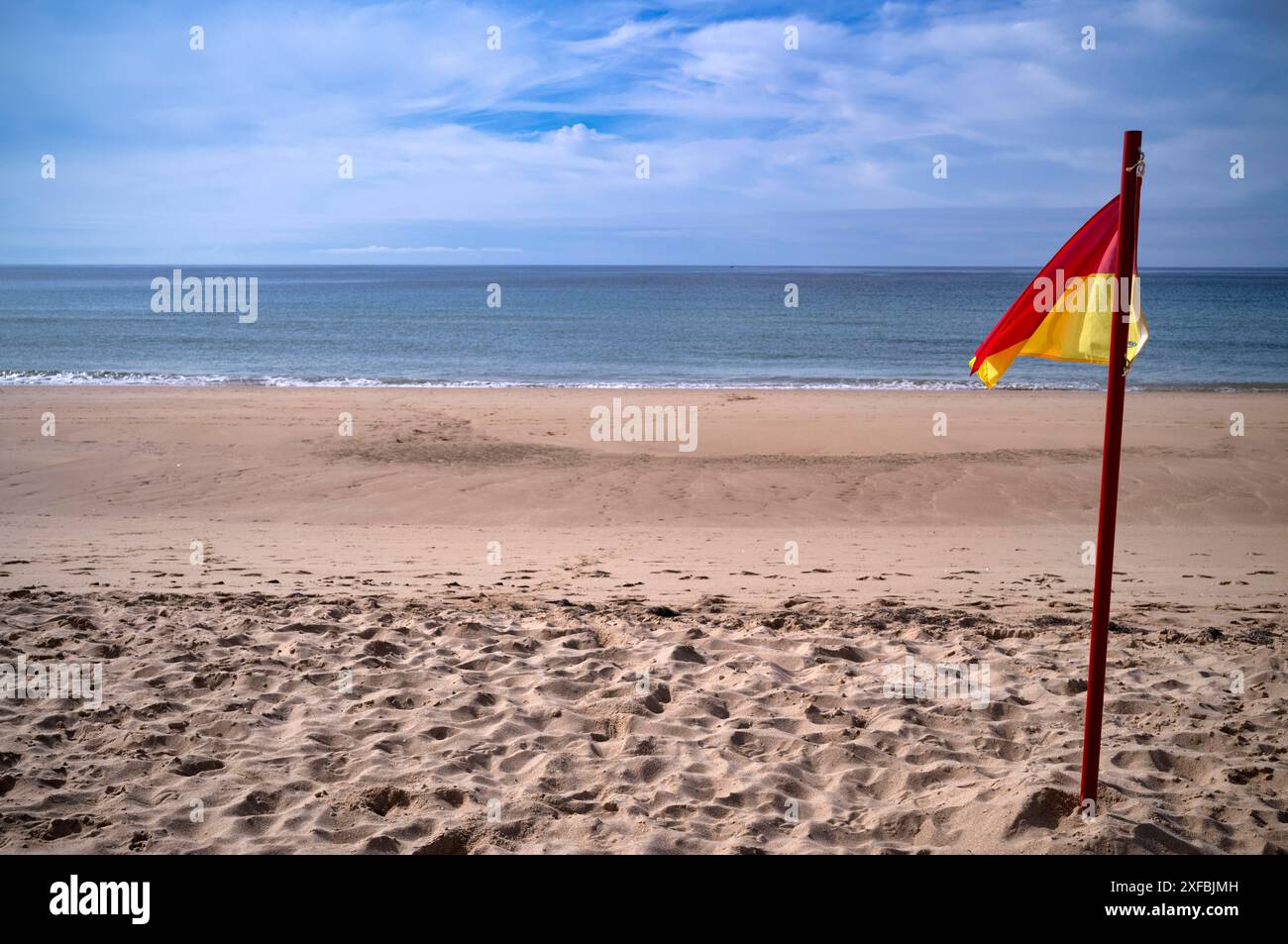 Flag on the beach, guarded, indication of ocean currents and tides ...