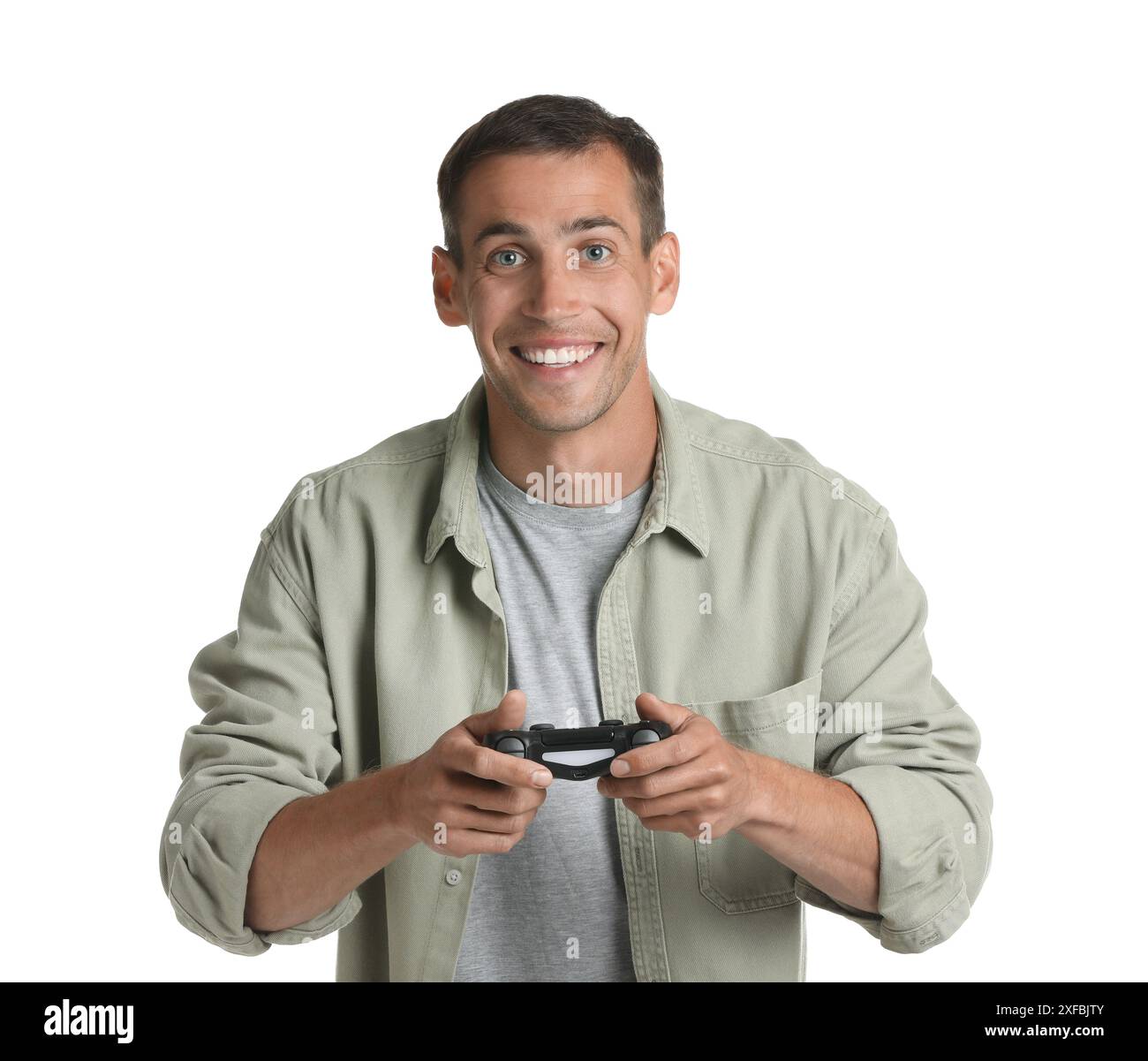 Happy man playing video games with controller on white background Stock ...