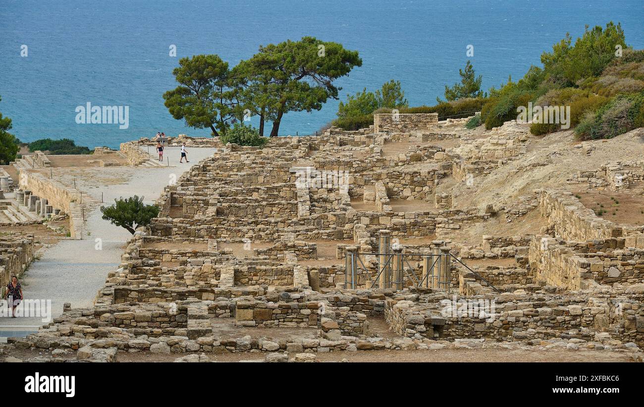 Remains of an ancient city overlooking the sea, surrounded by ...