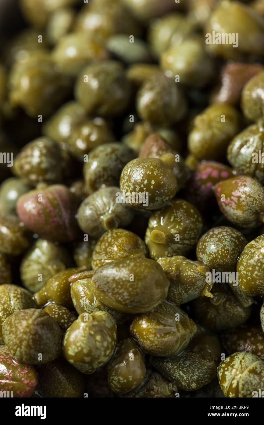 Organic marinated green capers hi-res stock photography and images - Alamy