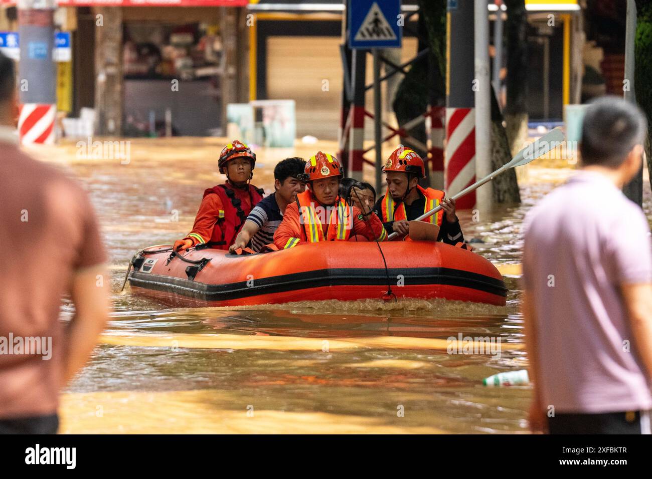 Changsha, China's Hunan Province. 2nd July, 2024. Firefighters transfer ...