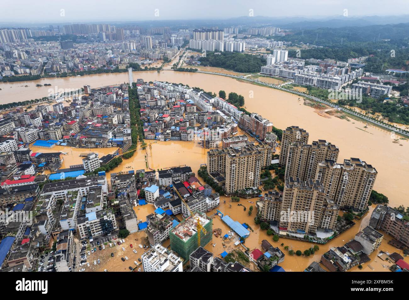 (240702) -- CHANGSHA, July 2, 2024 (Xinhua) -- An aerial drone photo shows the waterlogged ...