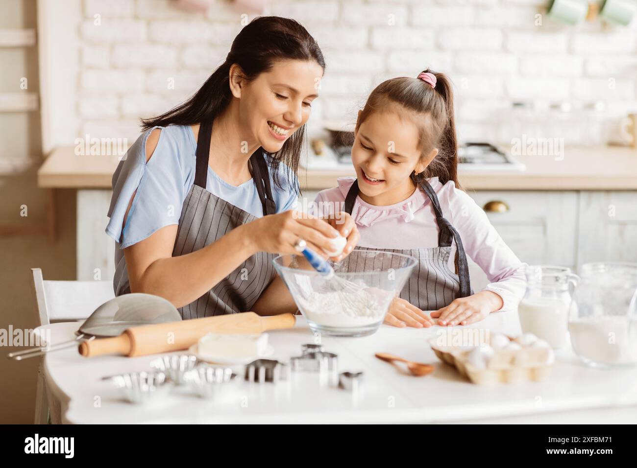 Mother and Daughter Baking Cookies Together in the Kitchen Stock Photo ...