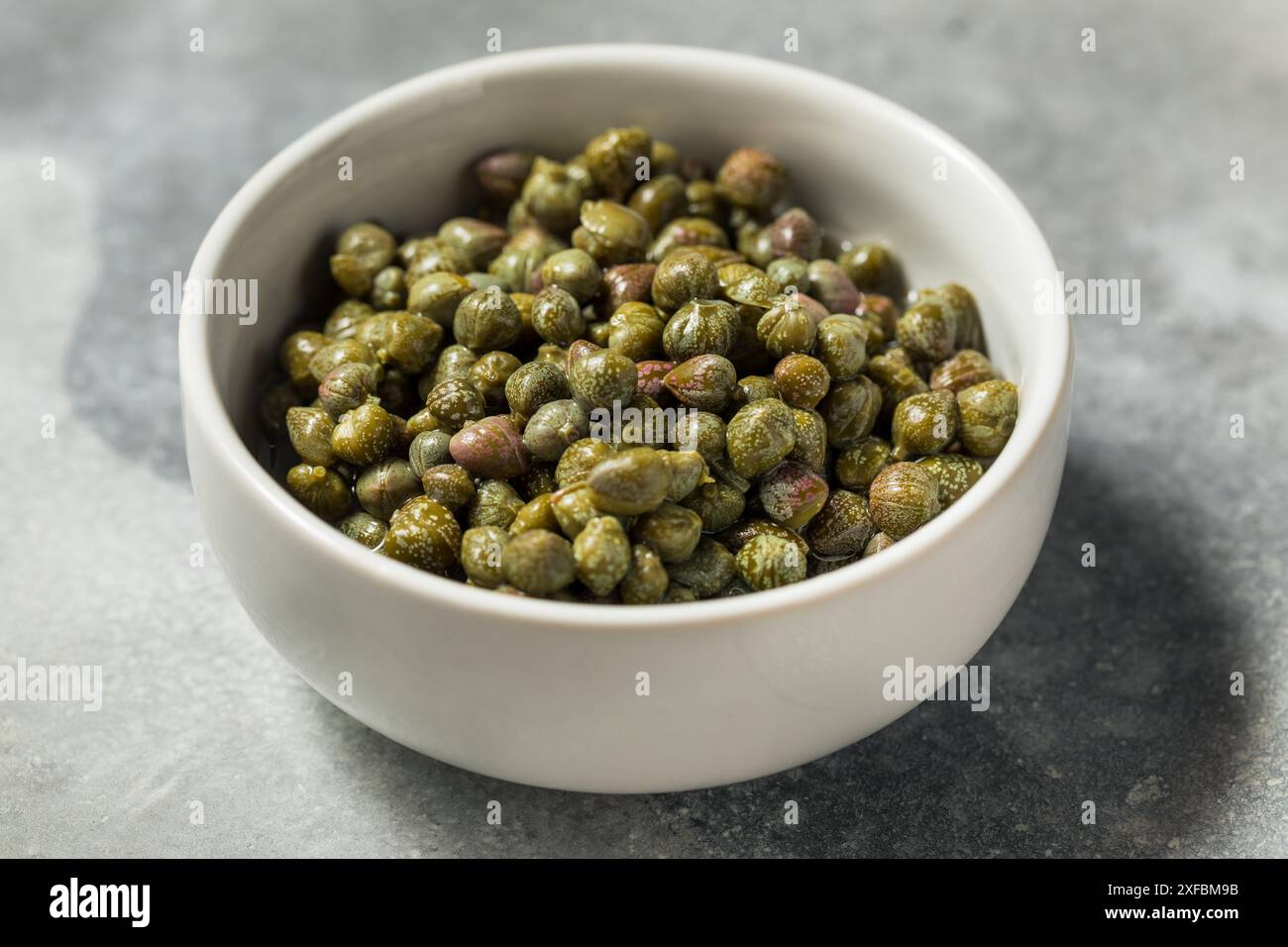 Organic raw pickled capers hi-res stock photography and images - Alamy