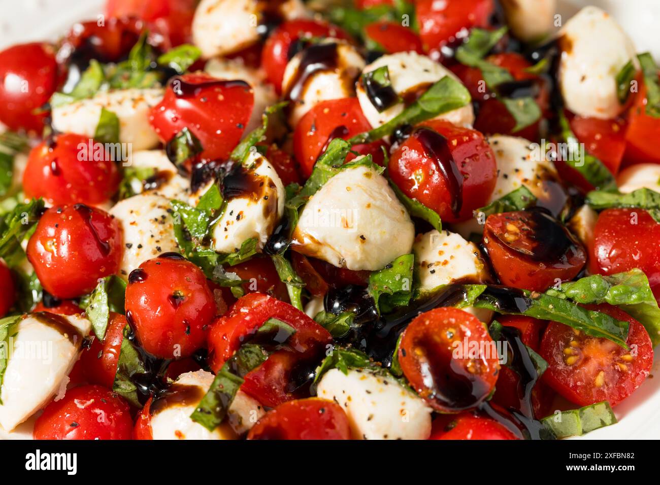Healthy Tomato Basil Caprese Salad with Mozzarella Stock Photo - Alamy