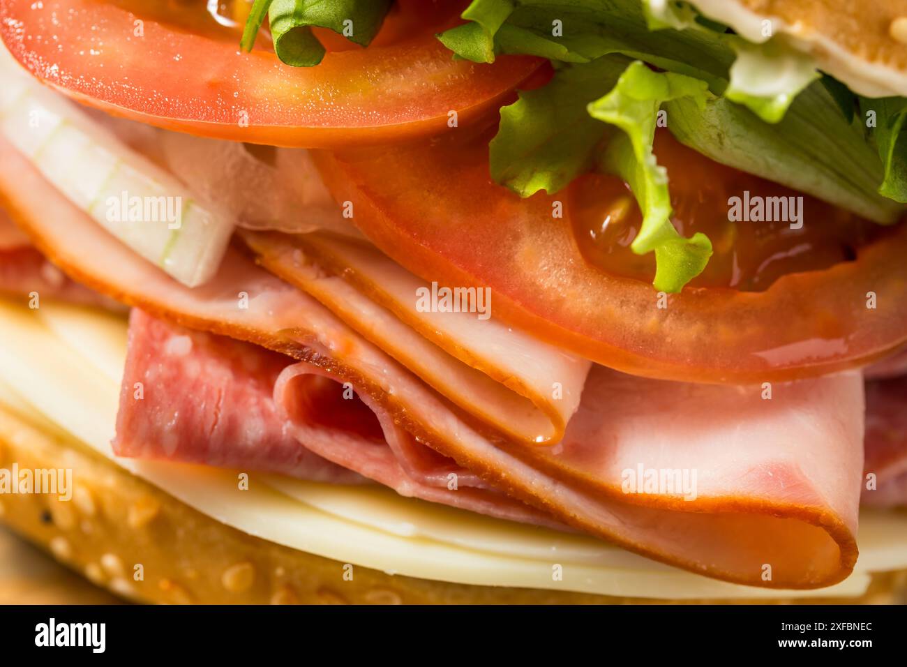 Homemade Deli Ham Sandwich on a Bun with Lettuce and Tomato Stock Photo ...
