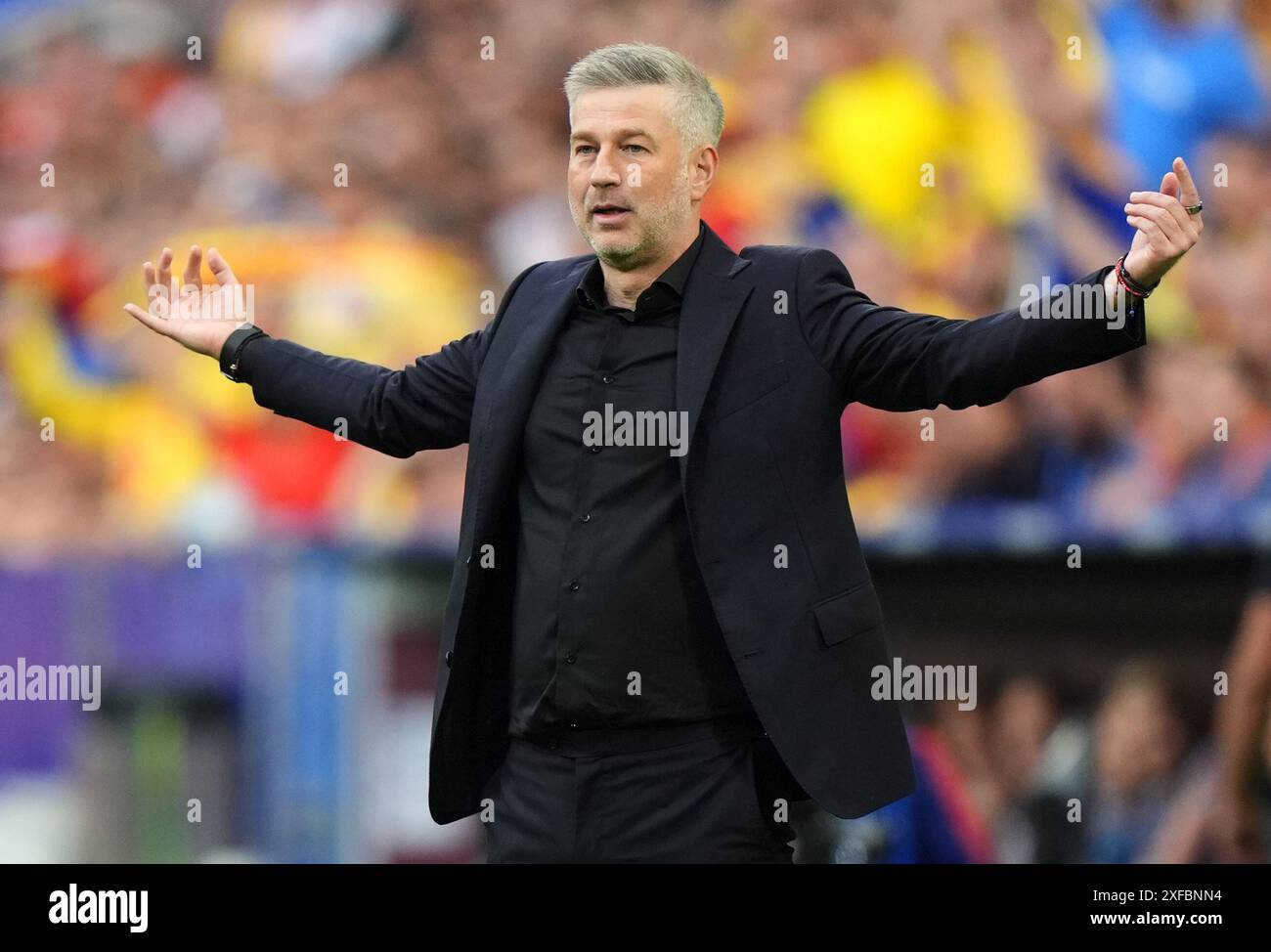 Romania manager Edward Iordanescu reacts on the touchline during the ...