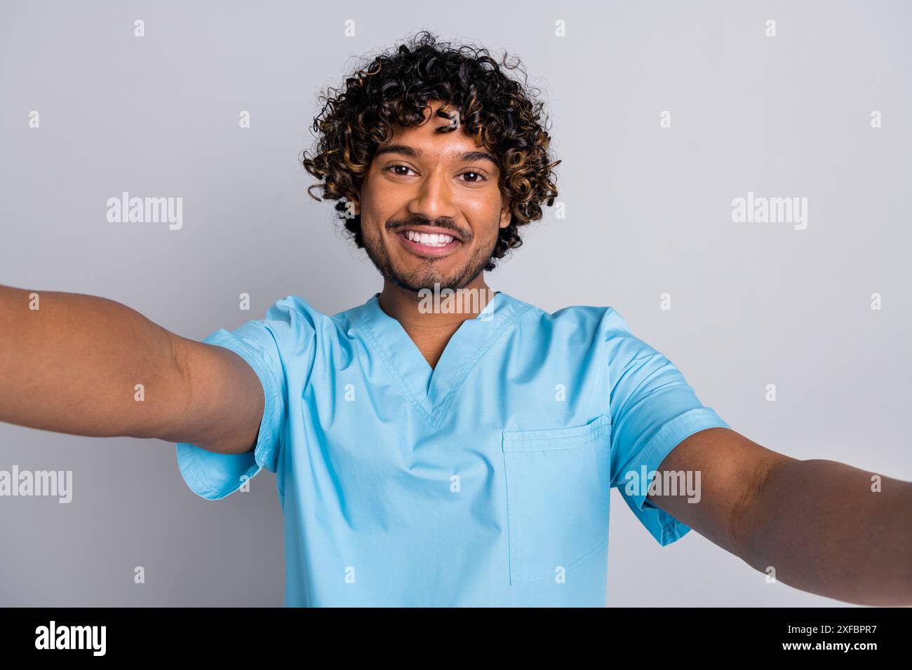 Photo of doctor guy smile make selfie consultation isolate dgrey color ...