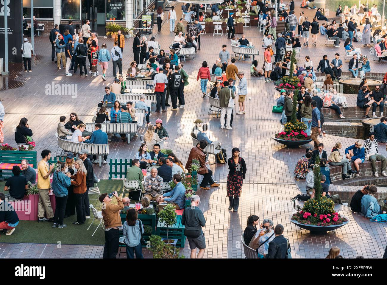 London, UK - June 28, 2024: A bustling scene at the Barbican Centre in ...
