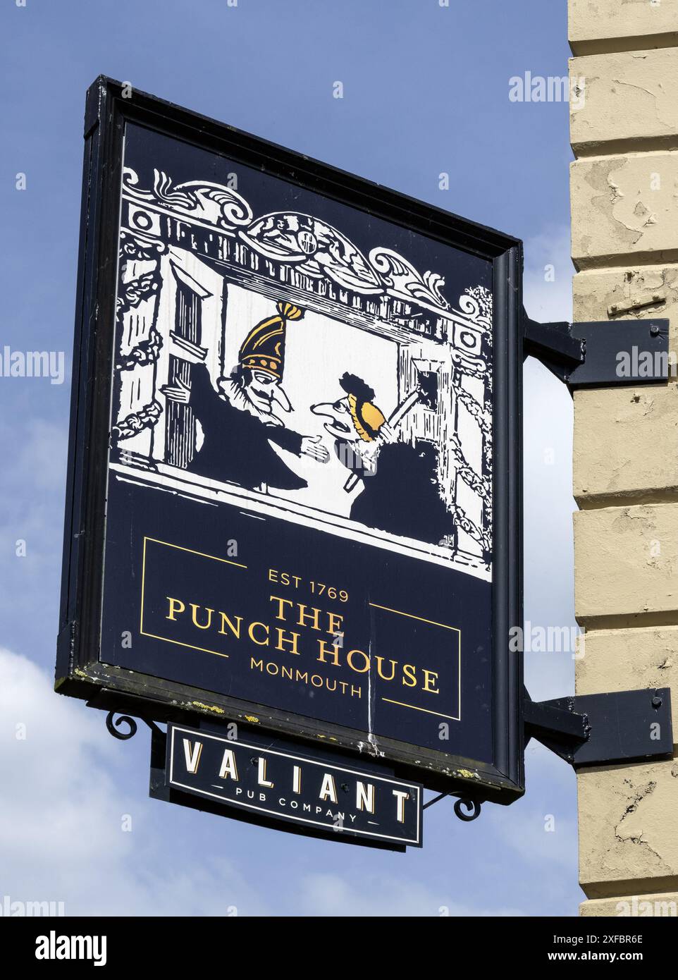 Traditional hanging pub sign at The Punch House - public house ...