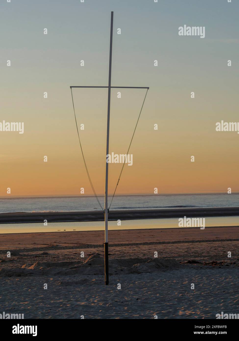Simple art installation on the beach at sunset, calming atmosphere ...