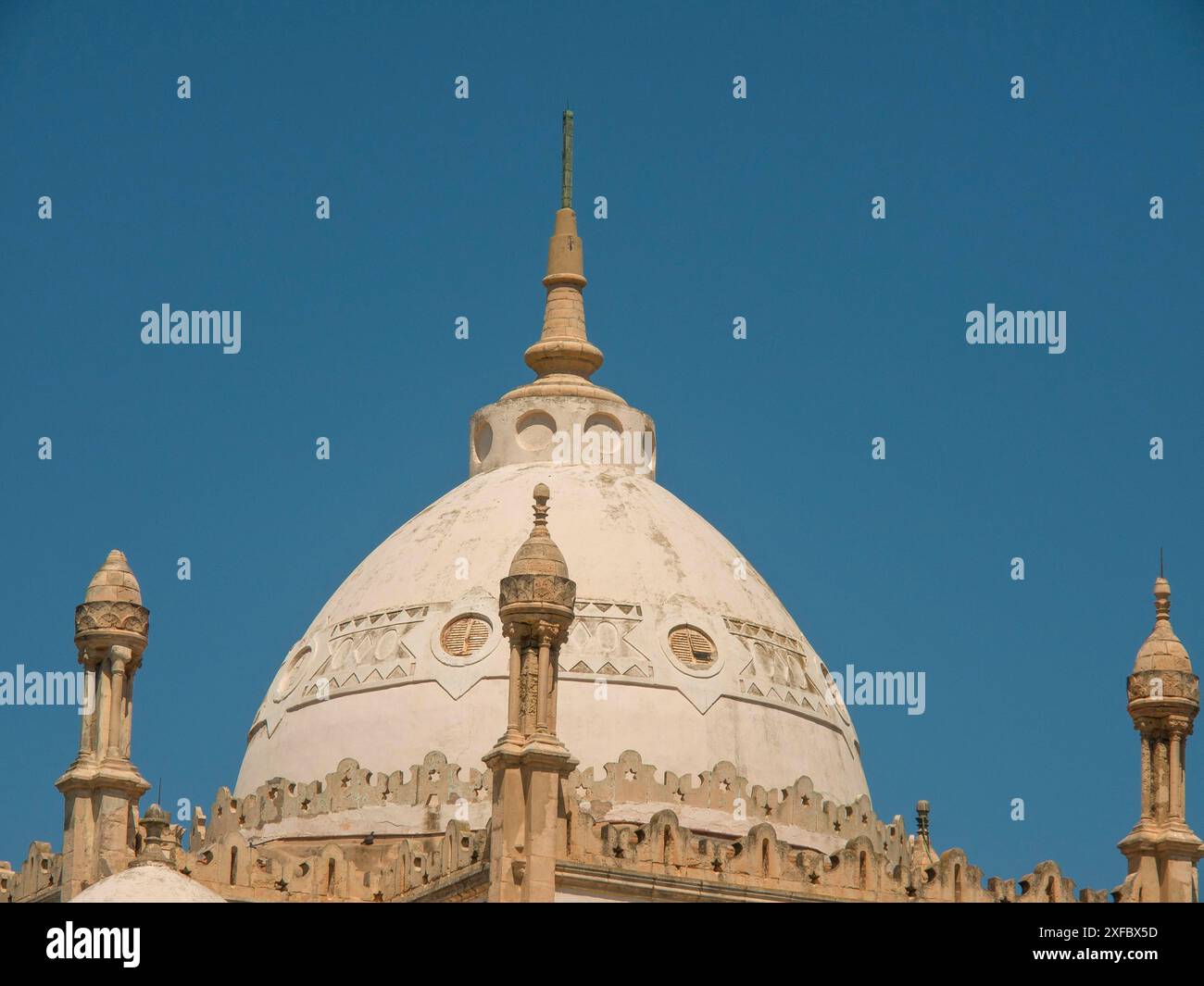 Dome-shaped building with ornaments and turquoise lithic roof details ...
