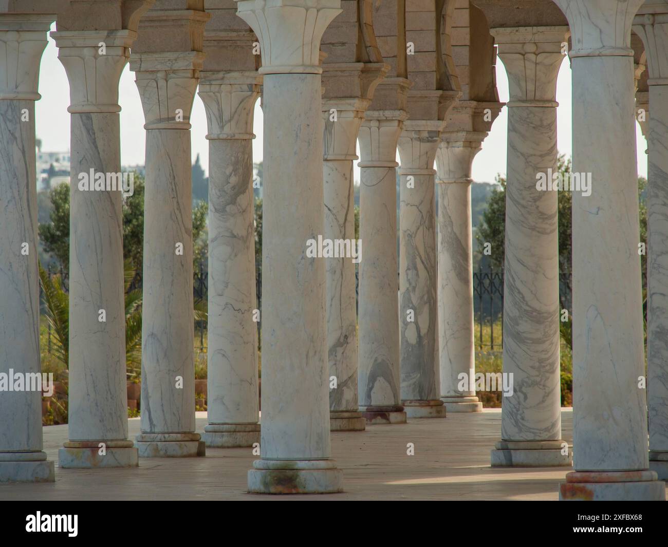 Marble columns in an architectural structure with arches, classic ...