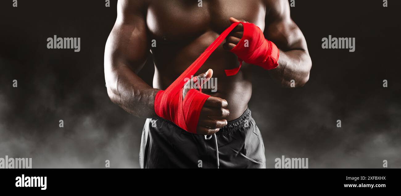 Boxer Wrapping Hands With Red Tape Stock Photo - Alamy