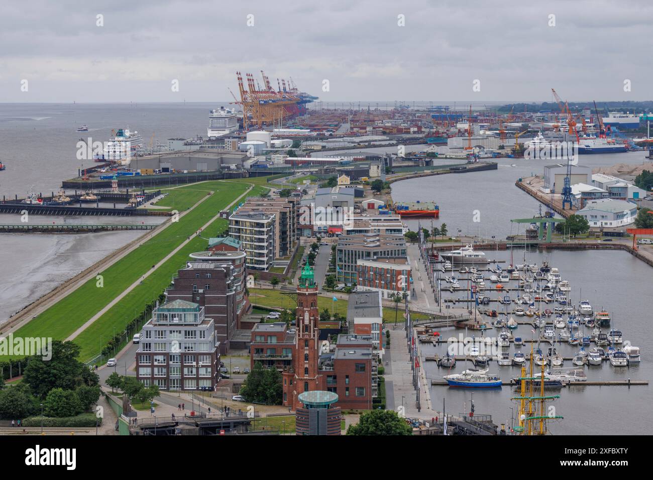 Aerial view of a harbour area with city view and ship traffic ...
