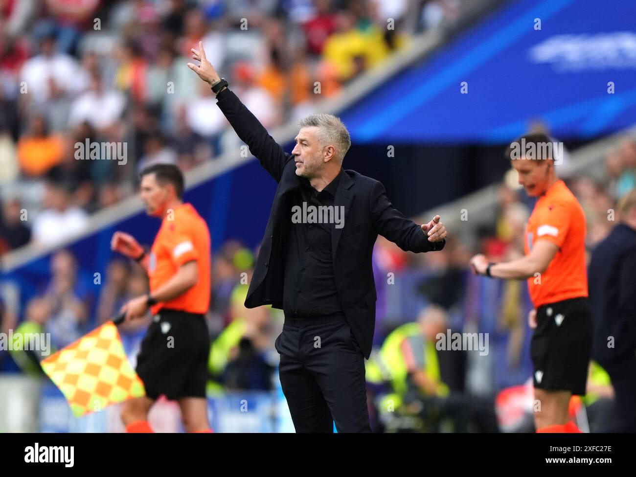 Romania manager Edward Iordanescu gestures on the touchline during the ...