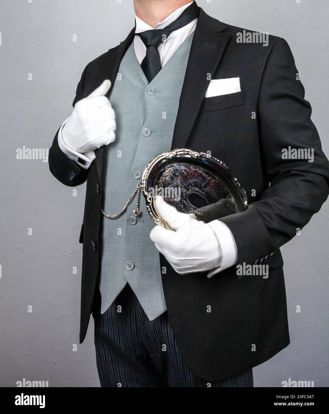 Classic Butler in Dark Suit and White Gloves Holding Serving Tray ...