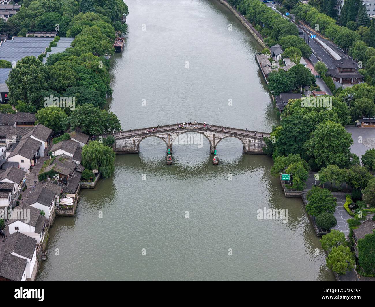 A photo is showing Gongchen Bridge, the tallest and longest stone arch ...