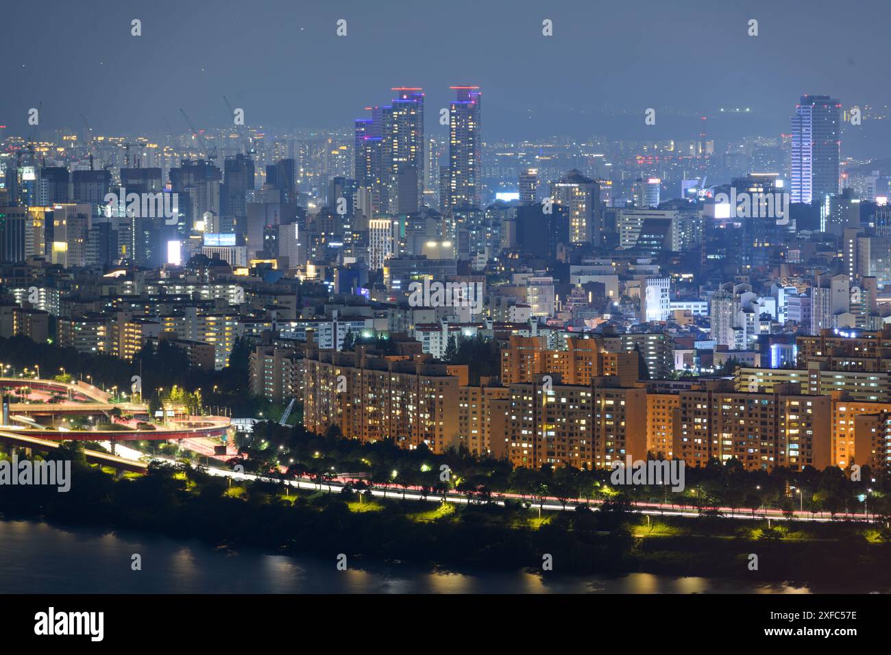 General view of vehicles driving along the riverside road of the Han ...