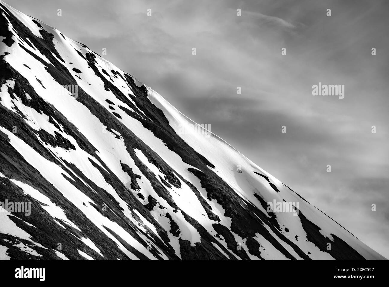 Beautiful snow capped mountain close up taken in the summer in Yukon ...