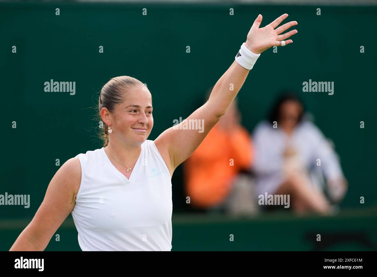 Jelena Ostapenko of Latvia waves after defeating Ajla Tomljanovic of ...